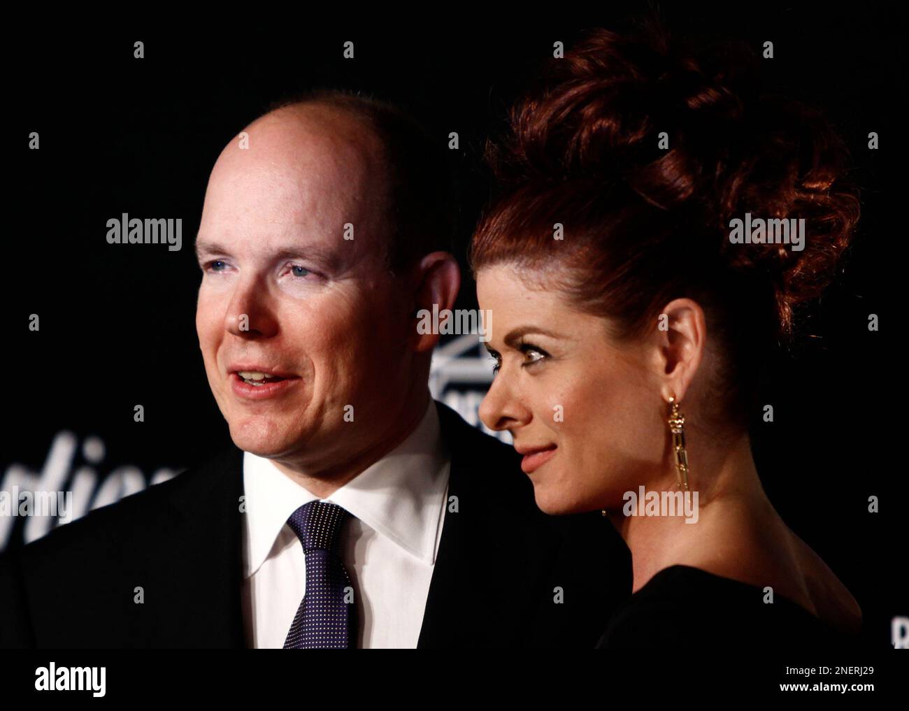 Prince Albert of Monaco, left, and Debra Messing pose together at the ...