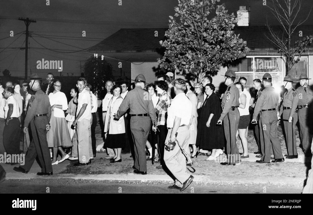 State police carrying riot sticks push back residents, Aug. 20, 1957 in ...