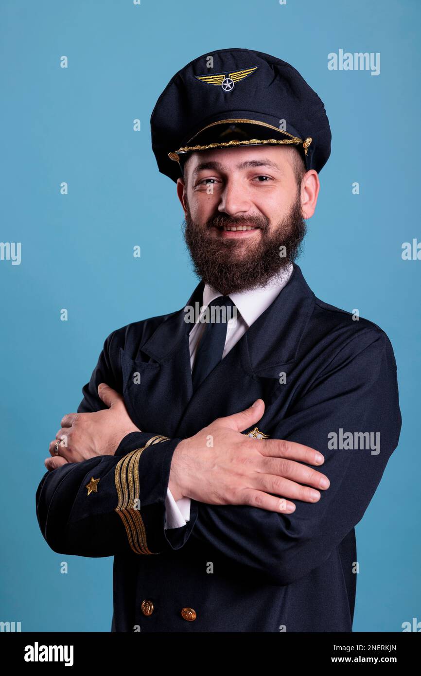 Aircraft aviator standing in professional uniform portrait, confident ...
