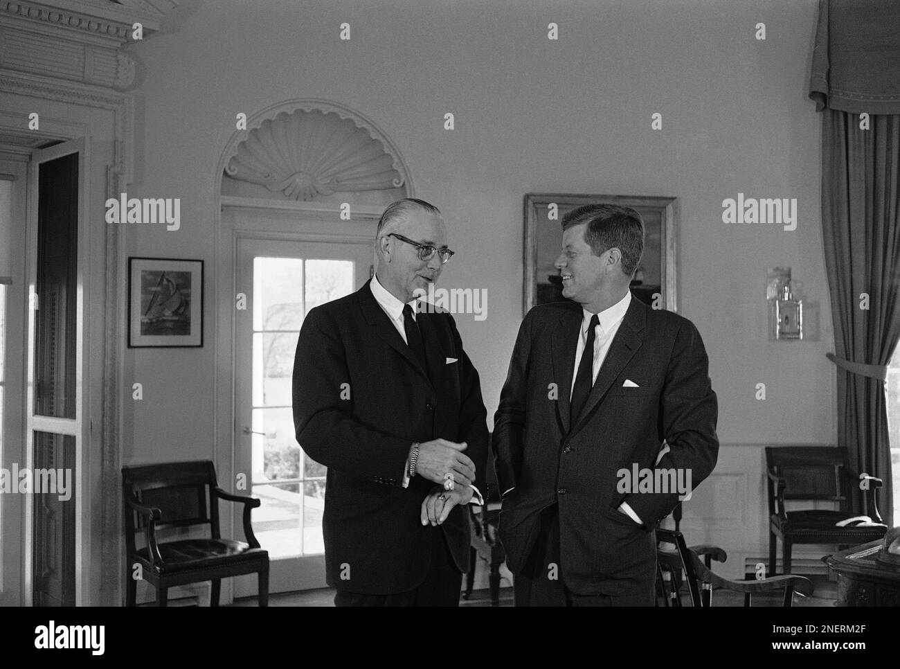 President John Kennedy and Fred Korth, new secretary of the Navy, talk ...