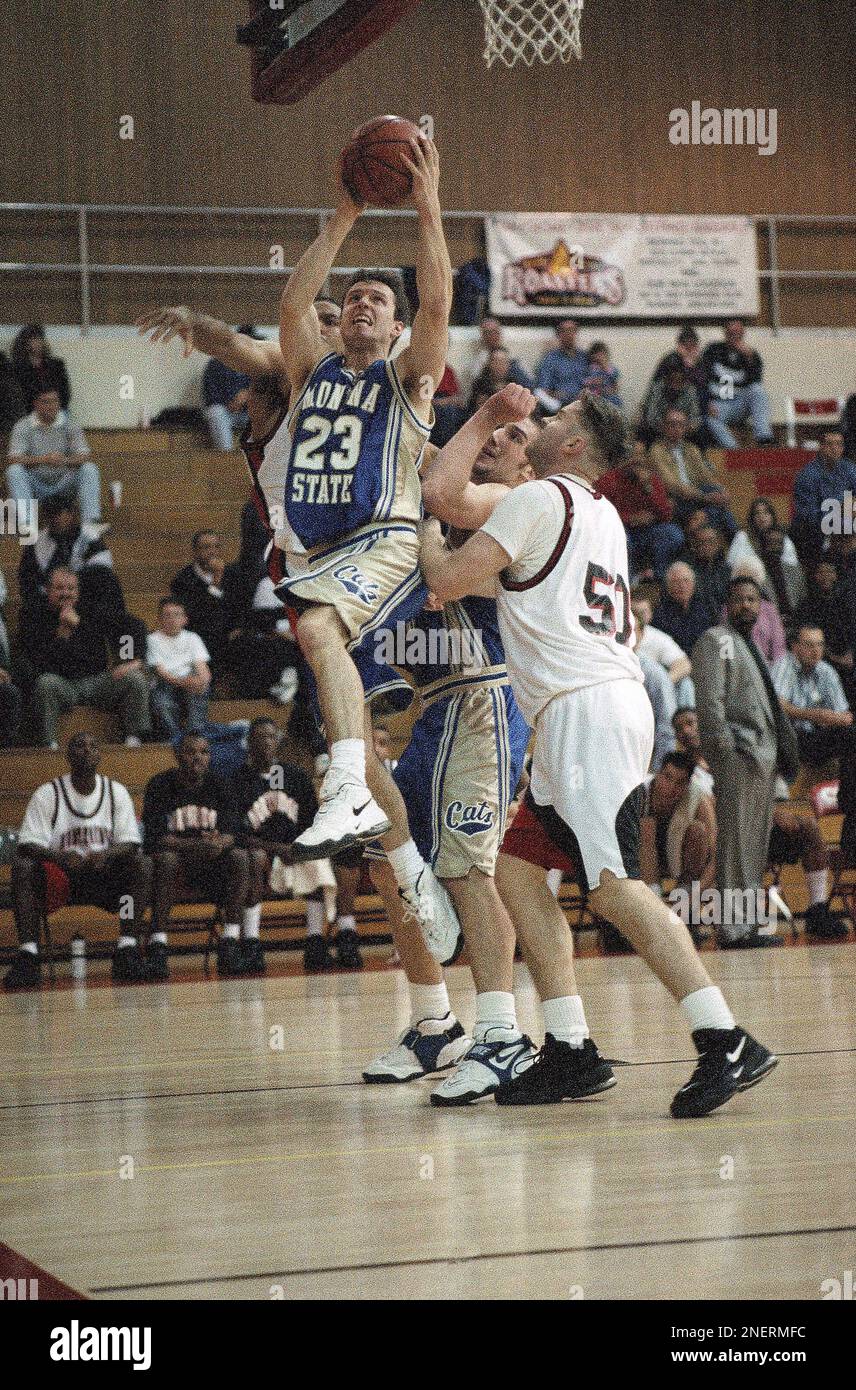 Montana State?s Lance Fay (23) goes up for a basket while teammate Nate ...
