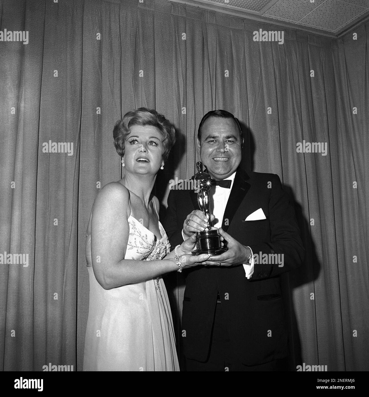 Comedian Jonathan Winters accepts Oscar won by Peter Ustinov as best ...
