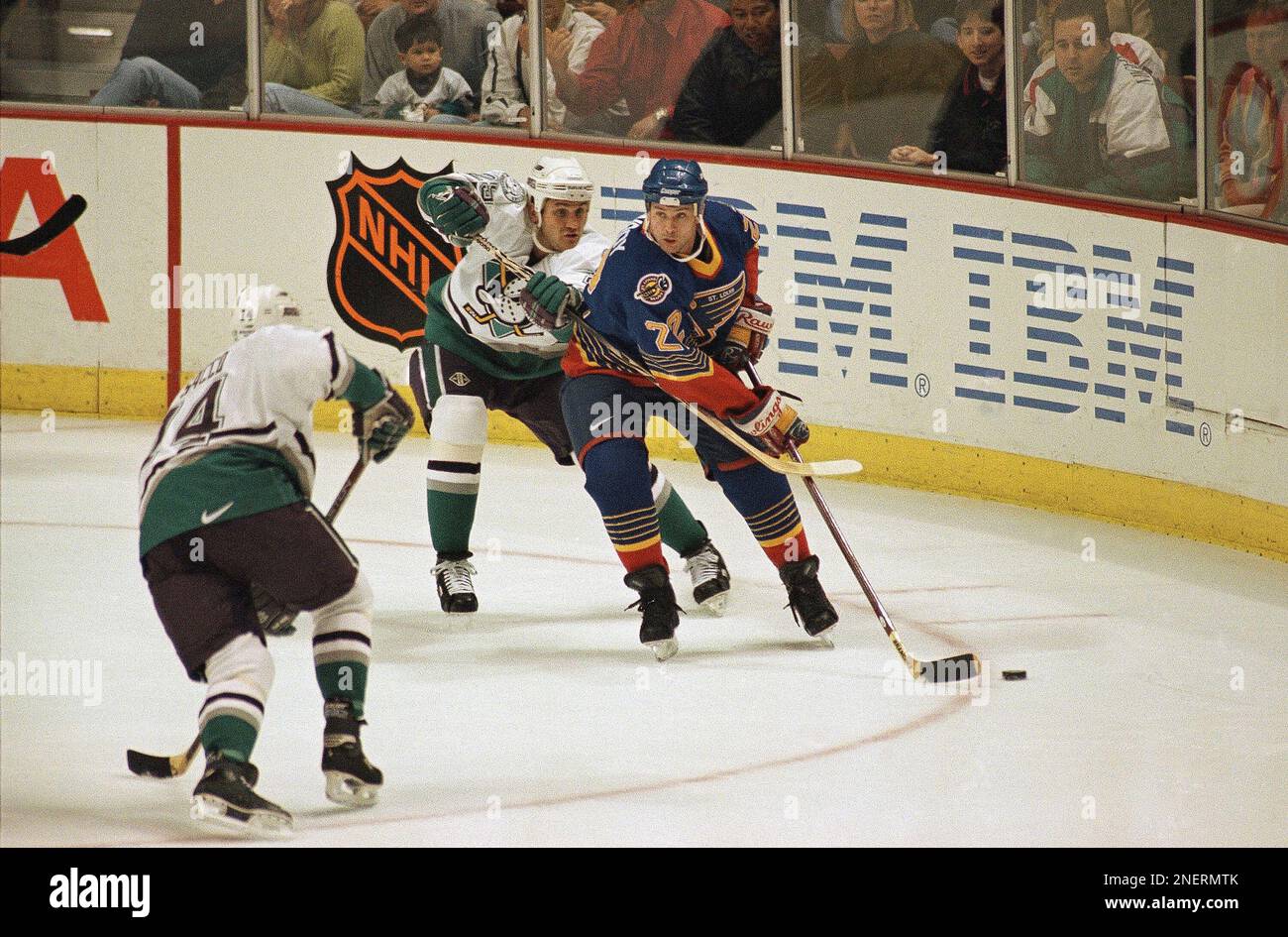 St. Louis Blues center Craig Conroy (22) maneuvers the puck as Anaheim ...