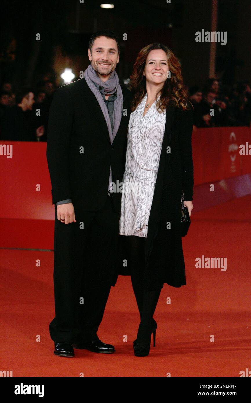 Italian actor Raul Bova, left, and his wife Chiara Giordano pose on the ...