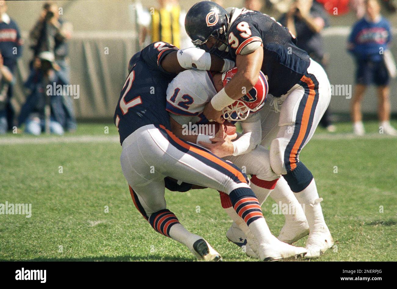 Buffalo Bills quarterback Jim Kelly is sacked by Chicago Bears Dave ...