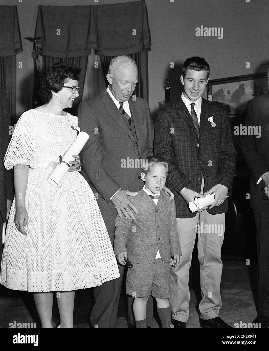 President Dwight Eisenhower and two recipients of Young American Medals ...