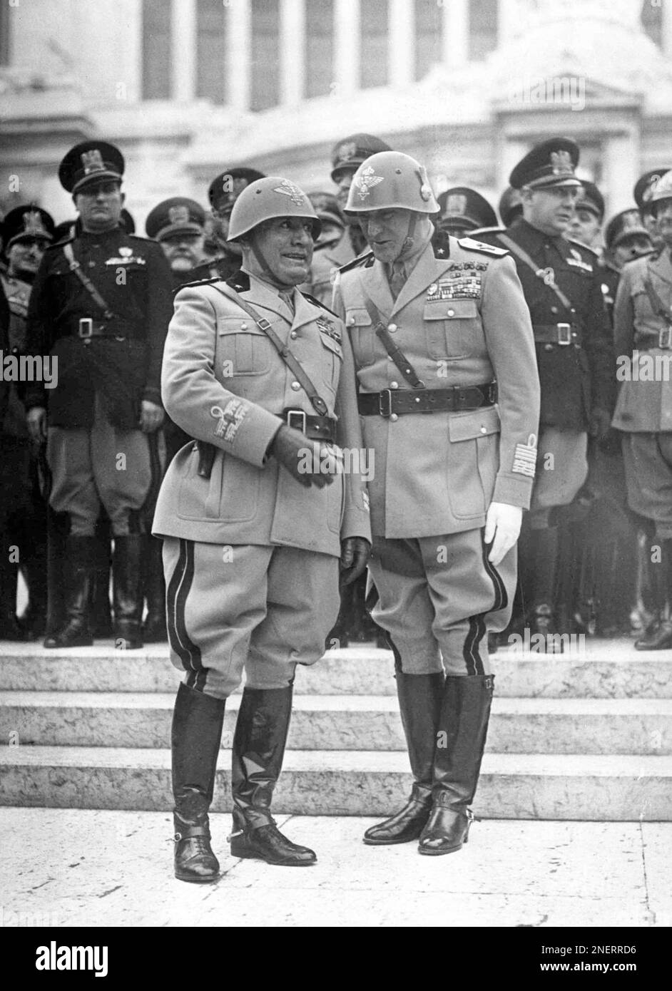 Italian Prime Minister Benito Mussolini, left, talks with his new Chief ...