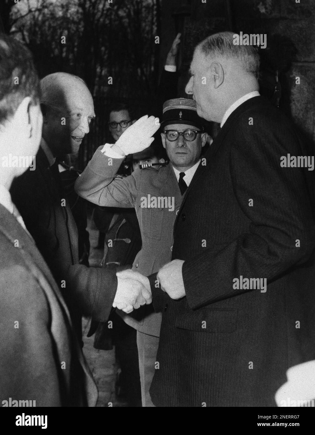 French President Charles de Gaulle, right, shakes hands with President ...