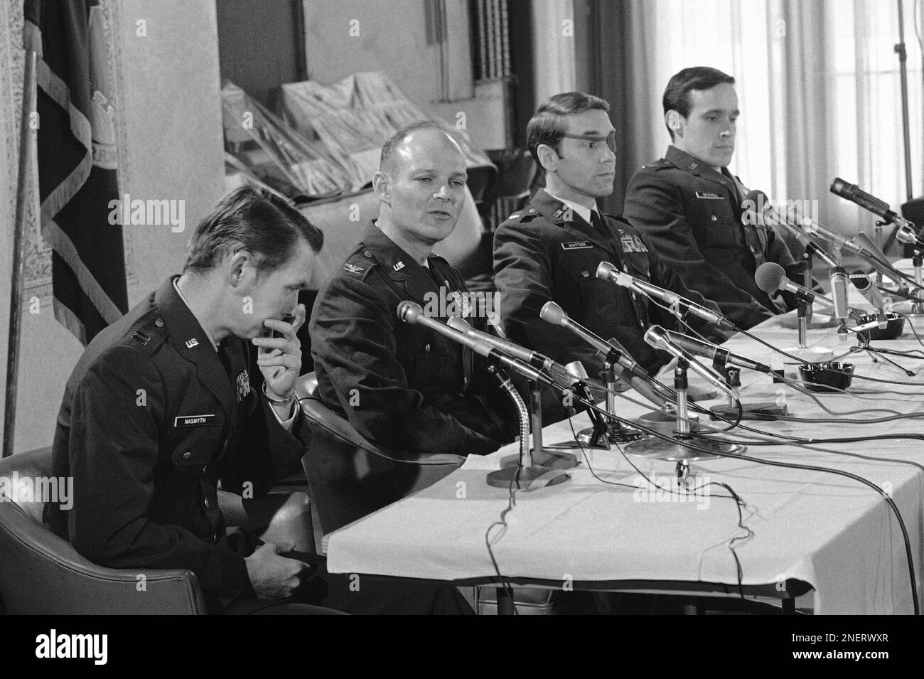 Col. Raymond J. Merritt, second from left, of Highland, Cal., tells a ...