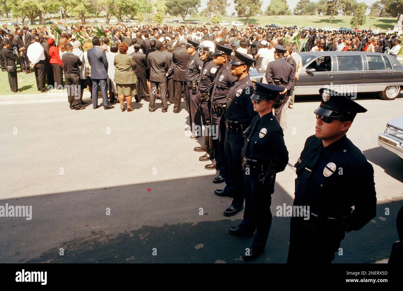 Los Angeles Police Department officers stand at attention during a ...