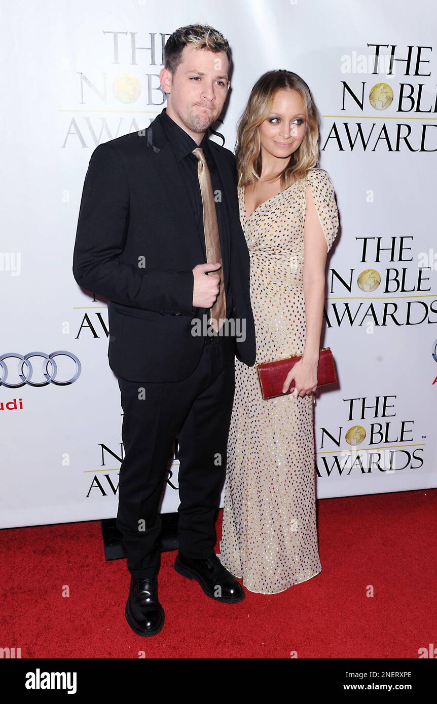 Joel Madden, at left, and Nicole Richie arrive to the First Annual ...