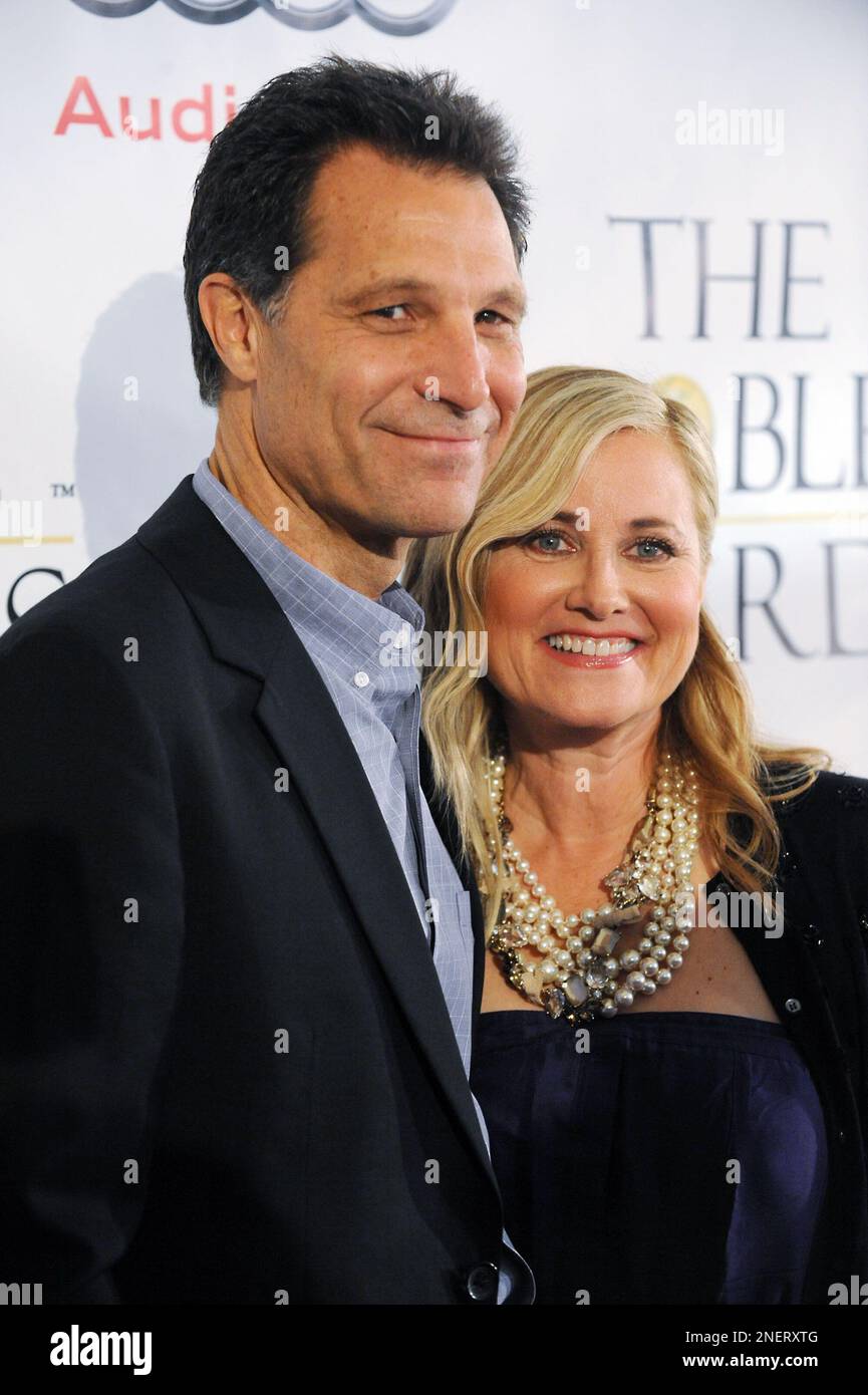 Maureen McCormick, at right, and her husband Michael Cummings arrive to the First Annual Noble ...