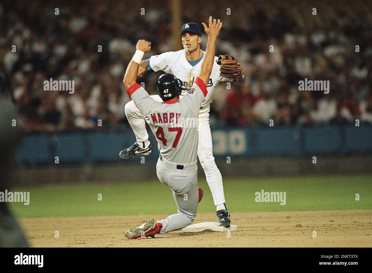St. Louis Cardinals John Mabry (47) throws his arms up but fails to ...