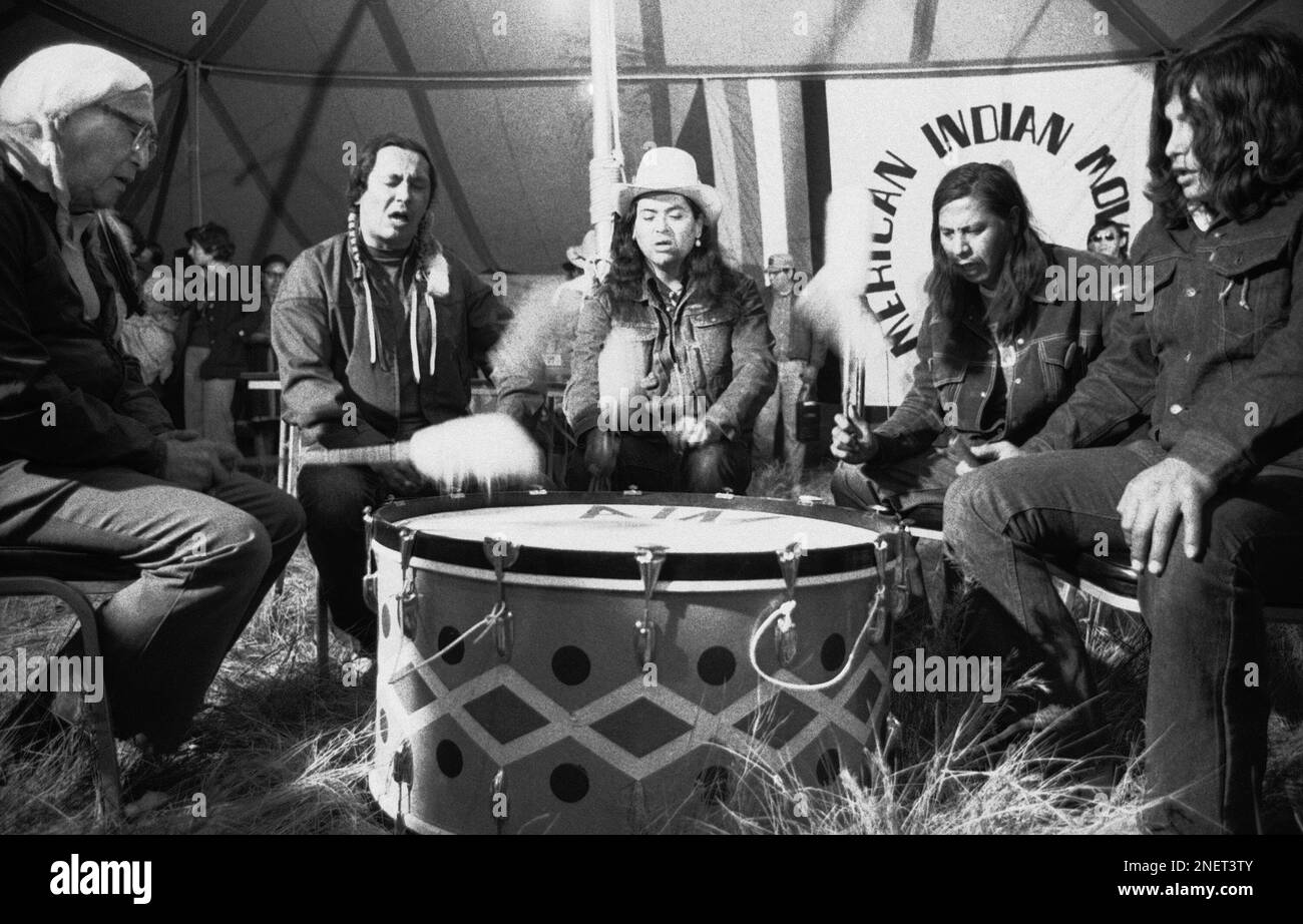 American Indiana Movement leader Russell Means, second left, and ...