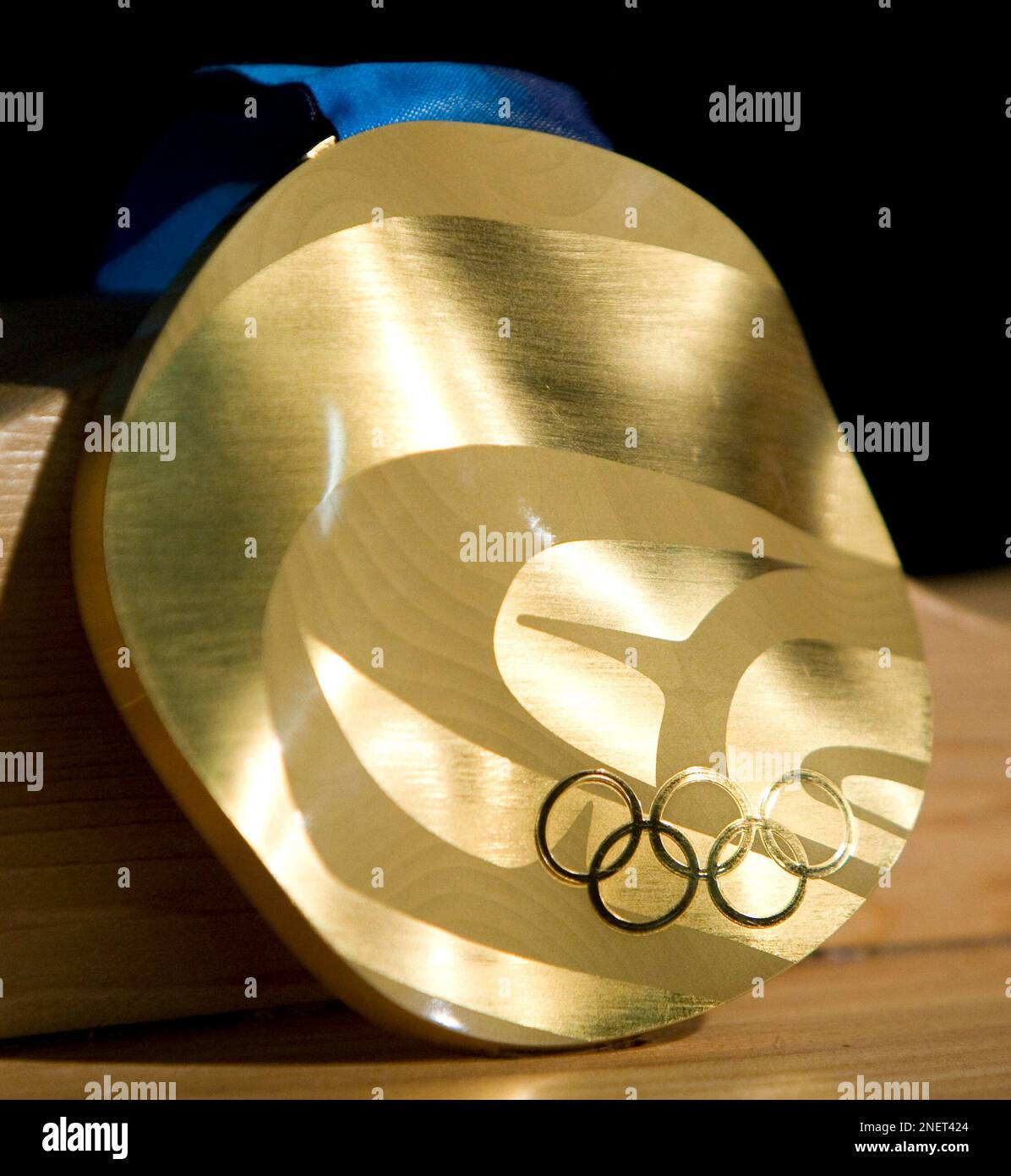 The Olympic gold medal is displayed during an unveiling ceremony in ...