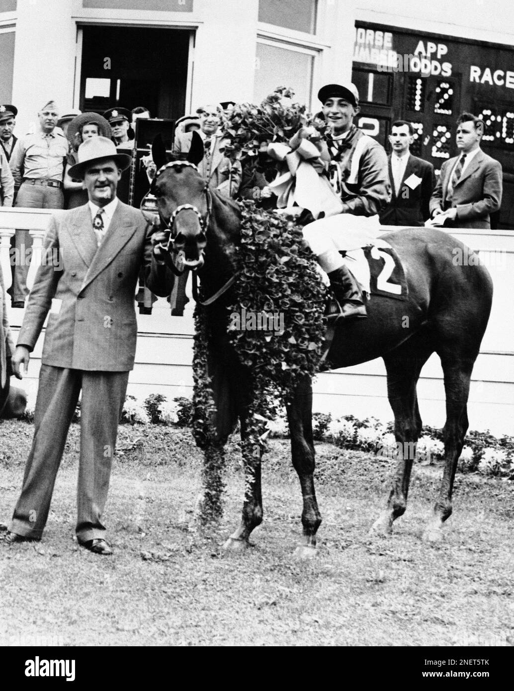 F.W. Hooper, of Jacksonville, Fla., smiles as he holds Hoop Jr ...