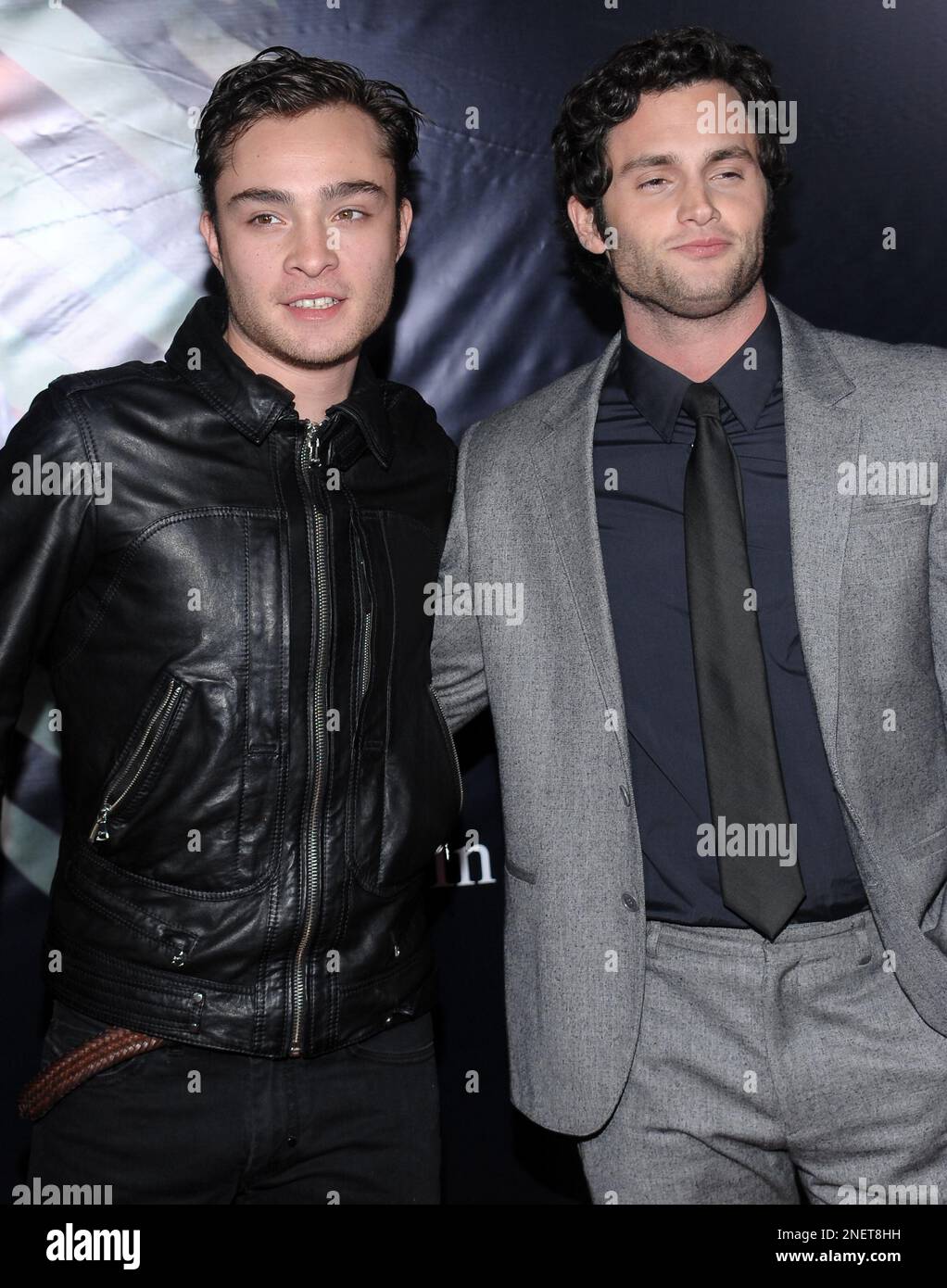 Actor Ed Westwick, left, greets fellow actor Penn Badgley at the ...