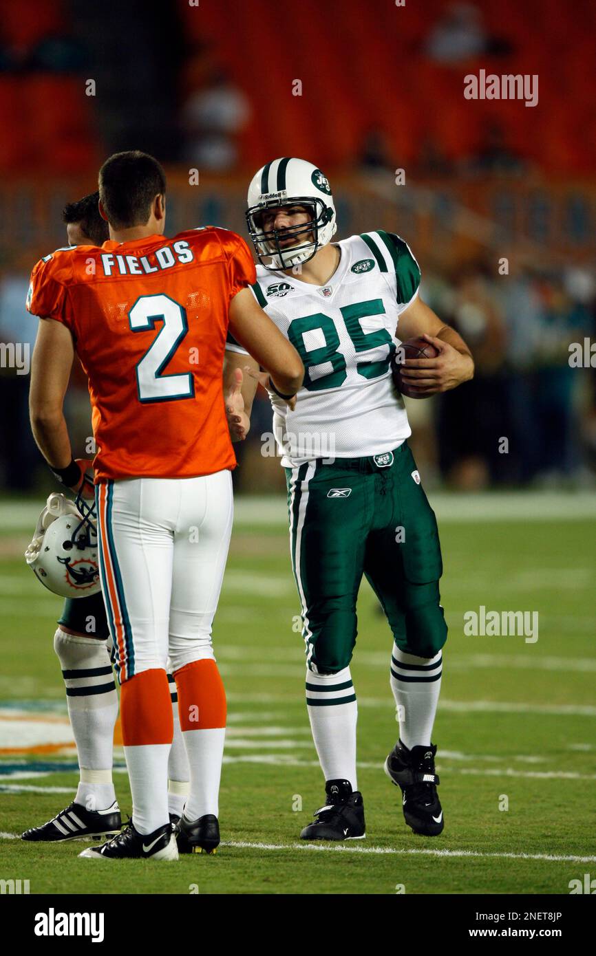 Miami Dolphins punter Brandon Fields (2) and New York Jets tight end ...