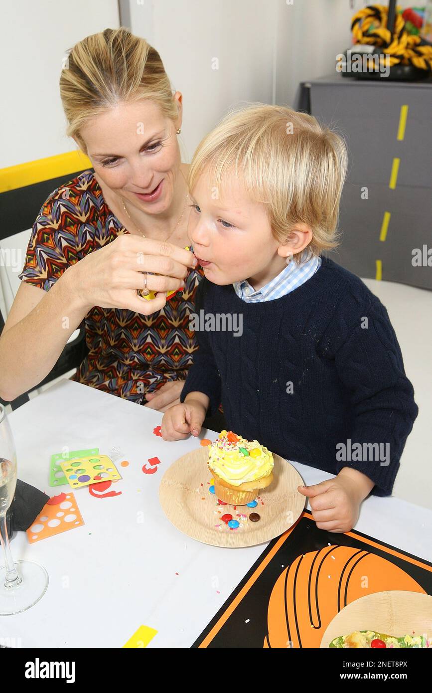 Actress Kelly Rutherford and son Hermes attend a Rocky the Robot Truck ...