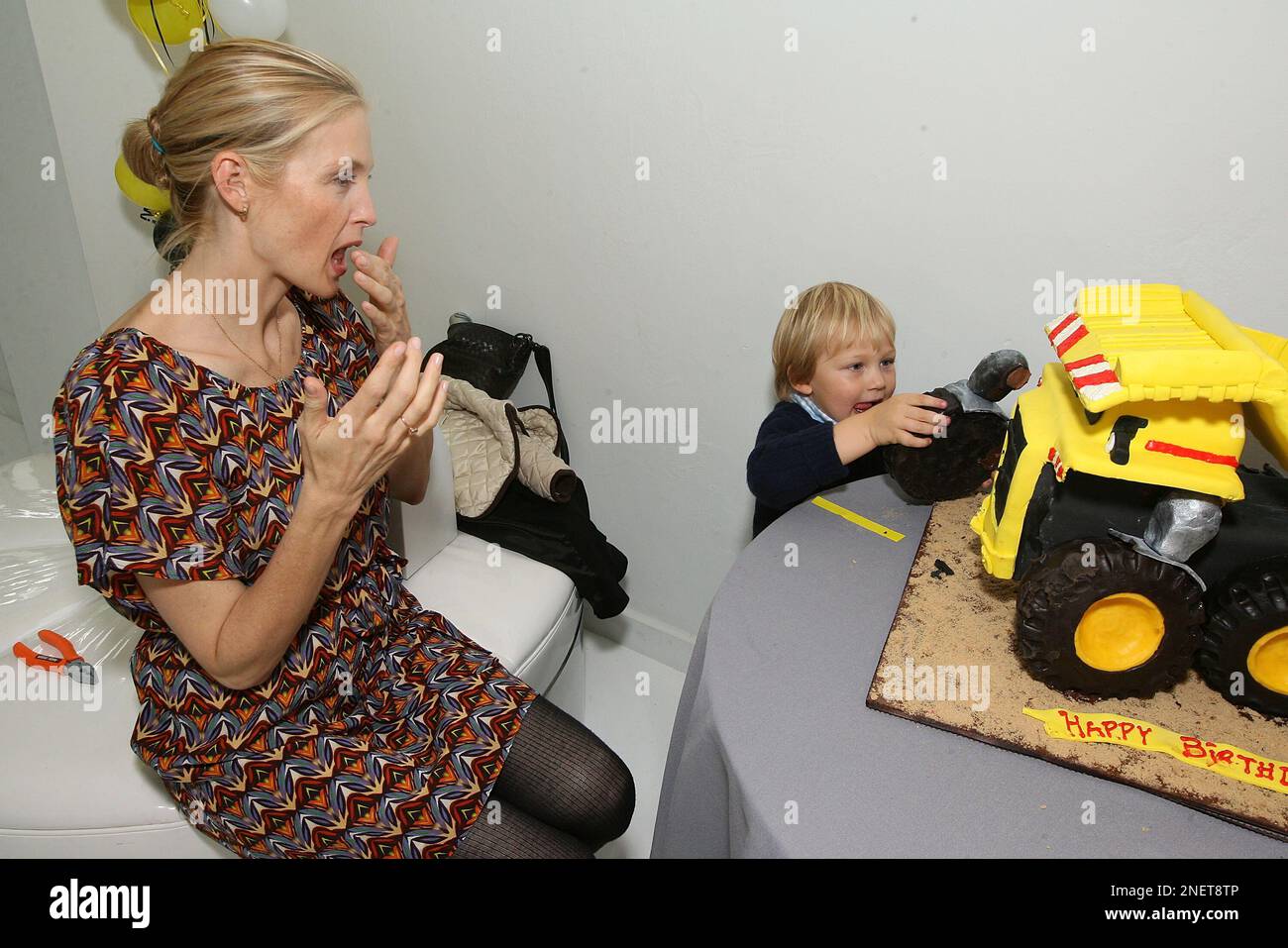 Kelly Rutherford and son Hermes attend a Rocky the Robot Truck themed ...