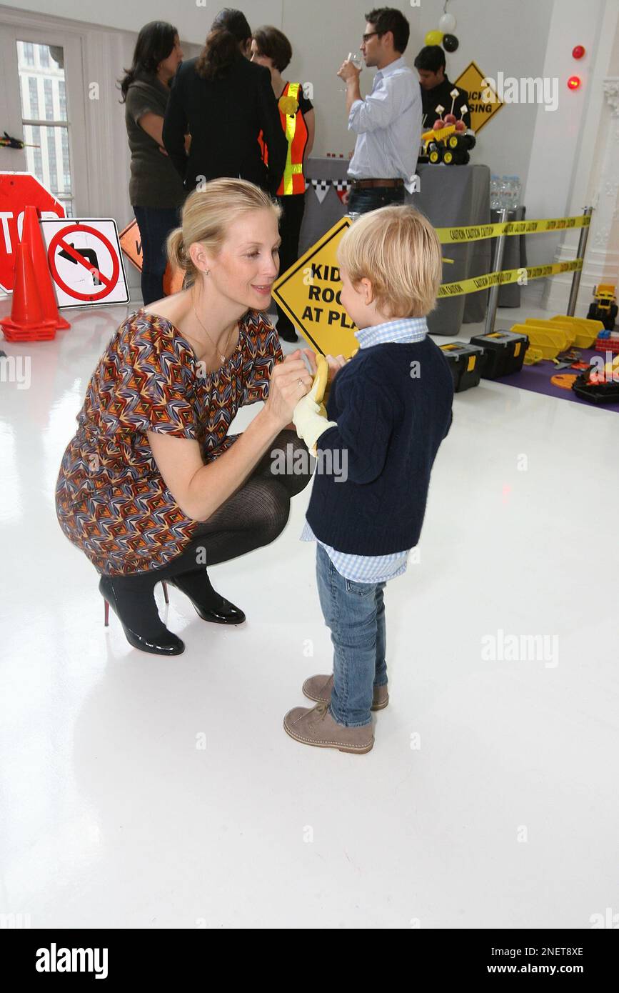 Kelly Rutherford and son Hermes attend a Rocky the Robot Truck themed ...