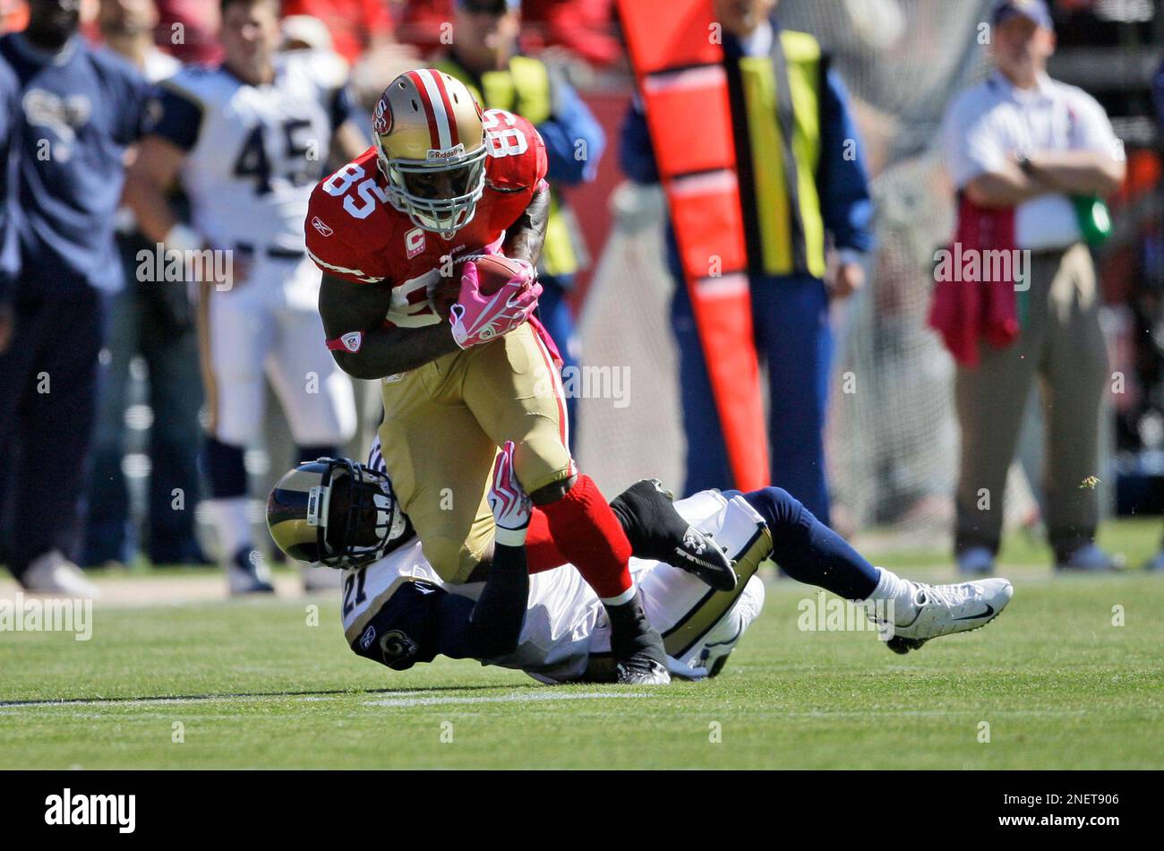 San Francisco 49ers tight end Vernon Davis (85) is tackled by St. Louis ...