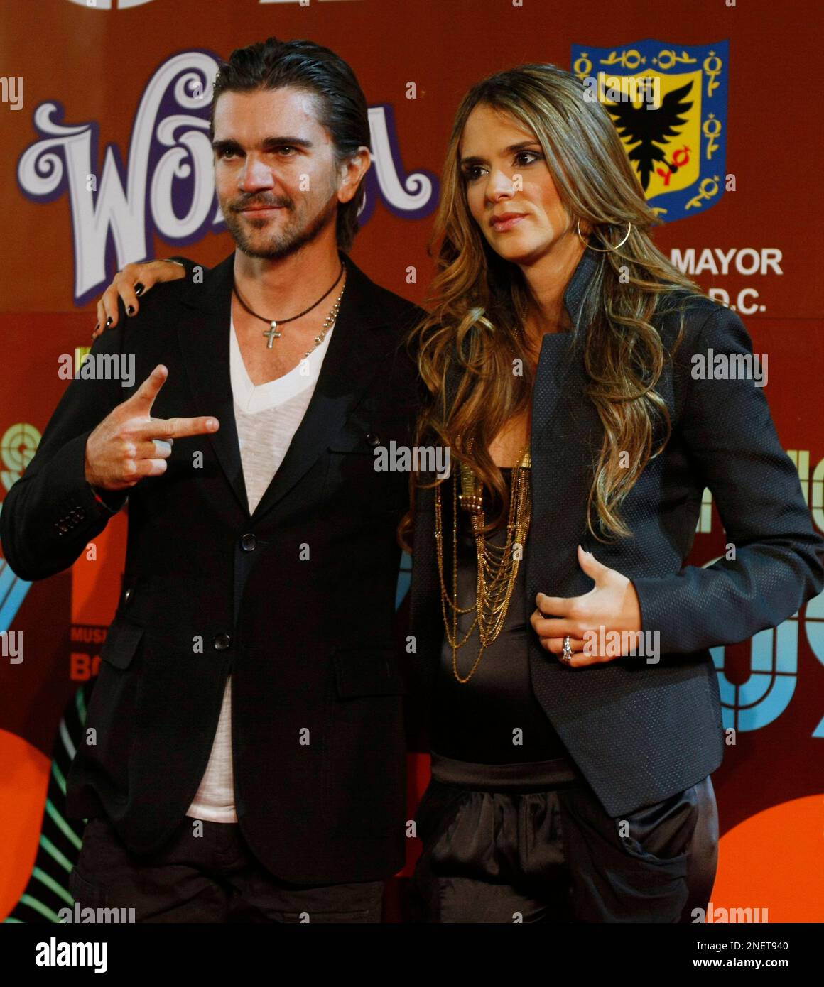 Colombia's singer Juanes, left, and his wife Karen Martinez pose for ...
