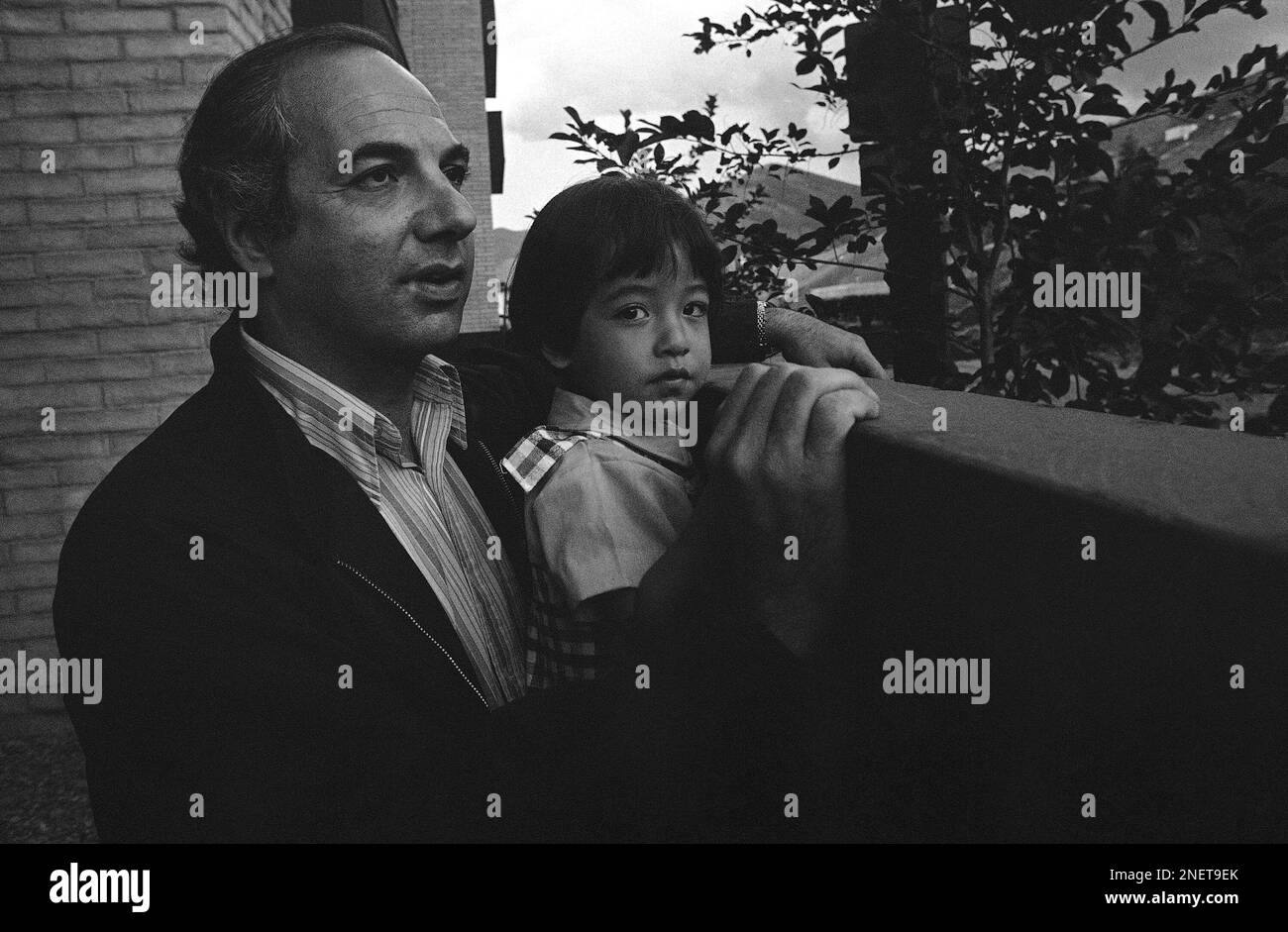 Ron Nessen and his son, Edward, pose outside White House press center ...