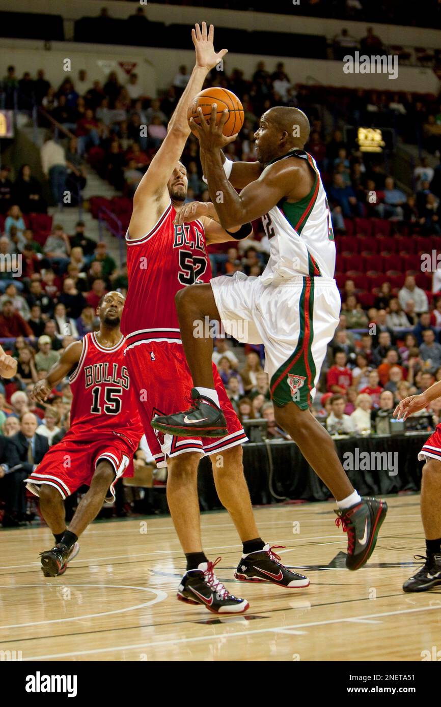 Milwaukee Bucks guard Michael Redd tries top go past Chicago Bulls ...