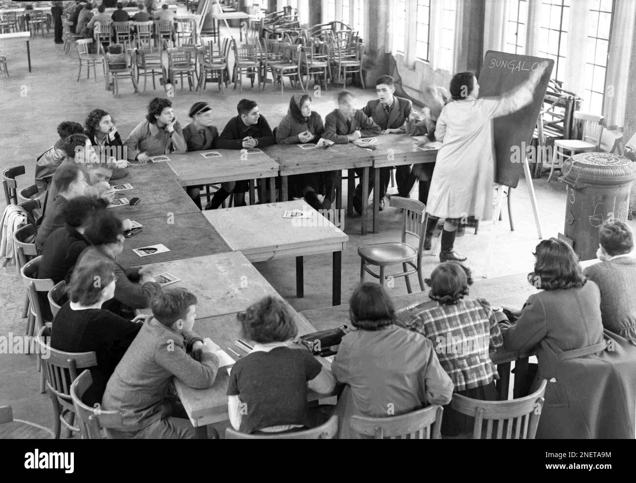 A group of German Jewish refugees sit in a makeshift schoolroom in a ... A group of German Jewish refugees sit in a makeshift schoolroom in a ...