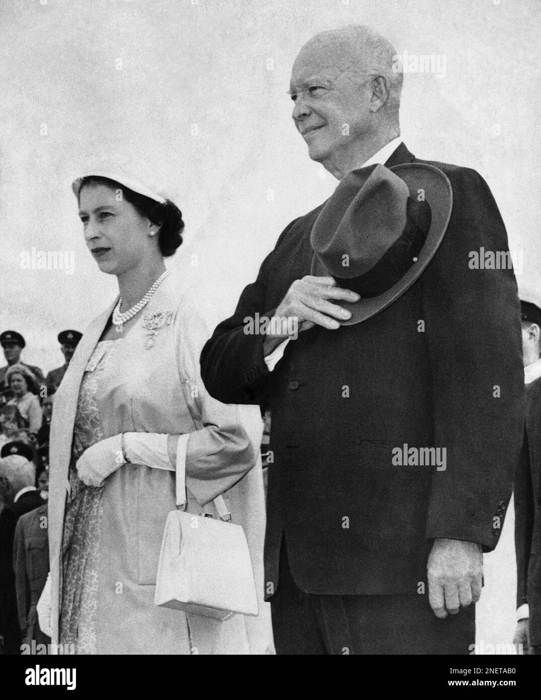 Queen Elizabeth and President Eisenhower stand at Dais as their ...