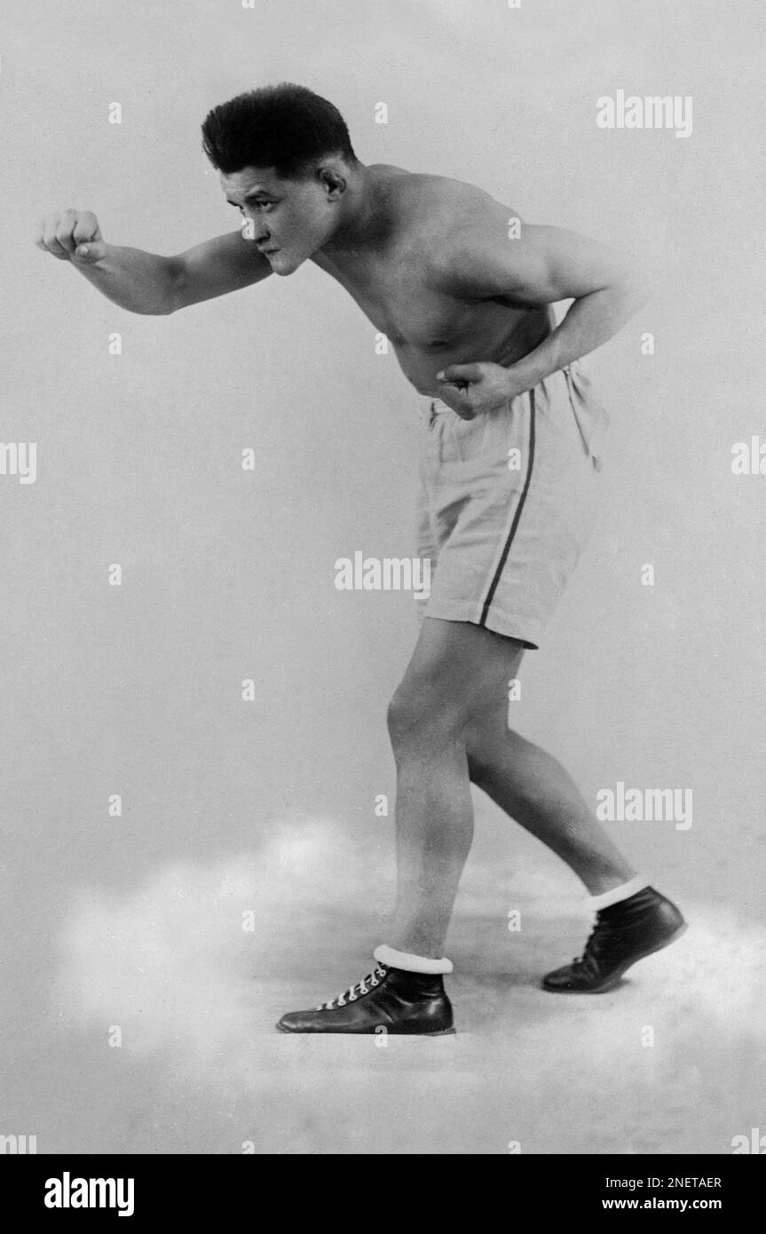 French flyweight boxer Emile Pladner poses for photographers before his ...
