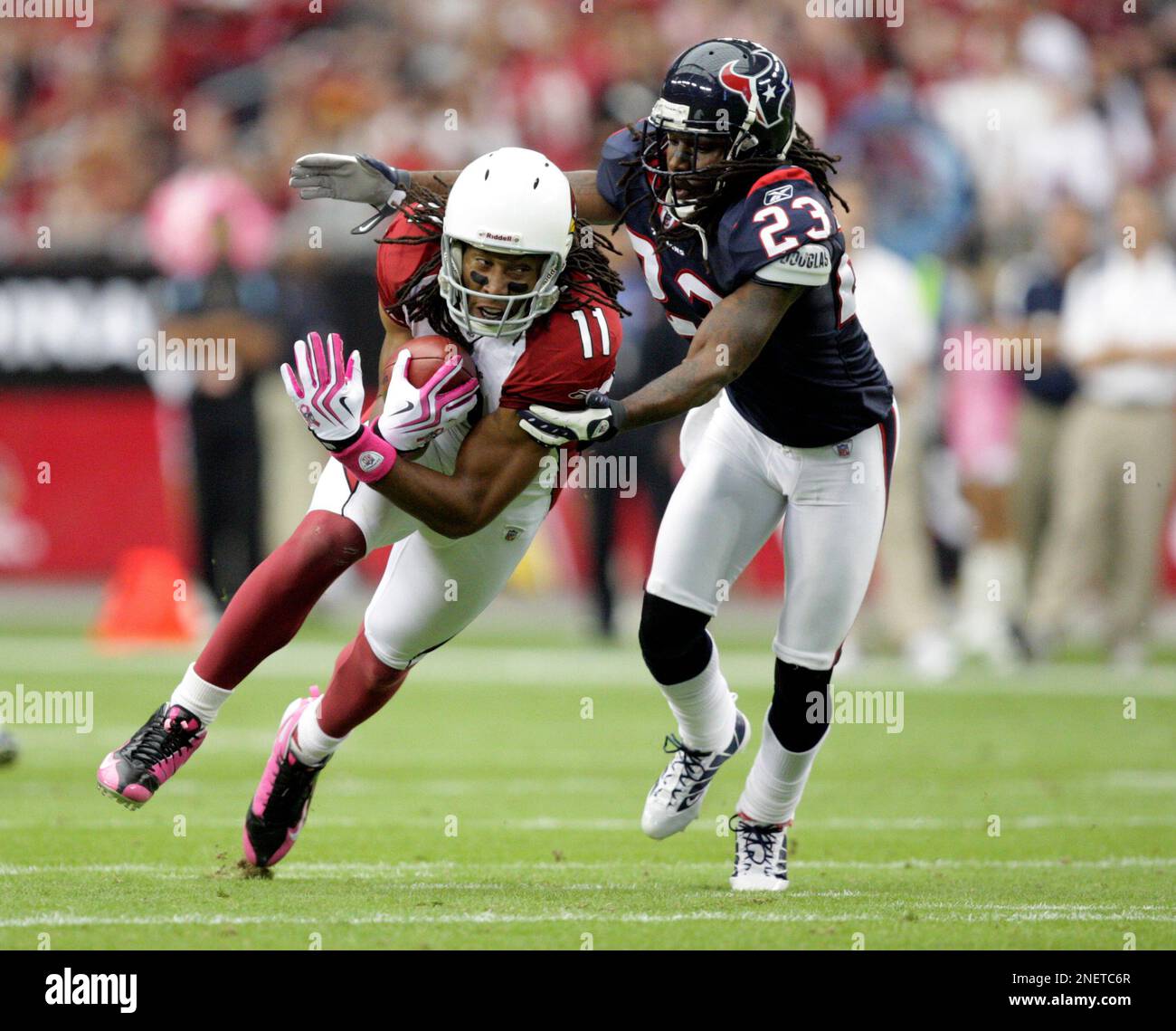 Arizona Cardinals wide receiver Larry Fitzgerald (11) picks up yardage ...