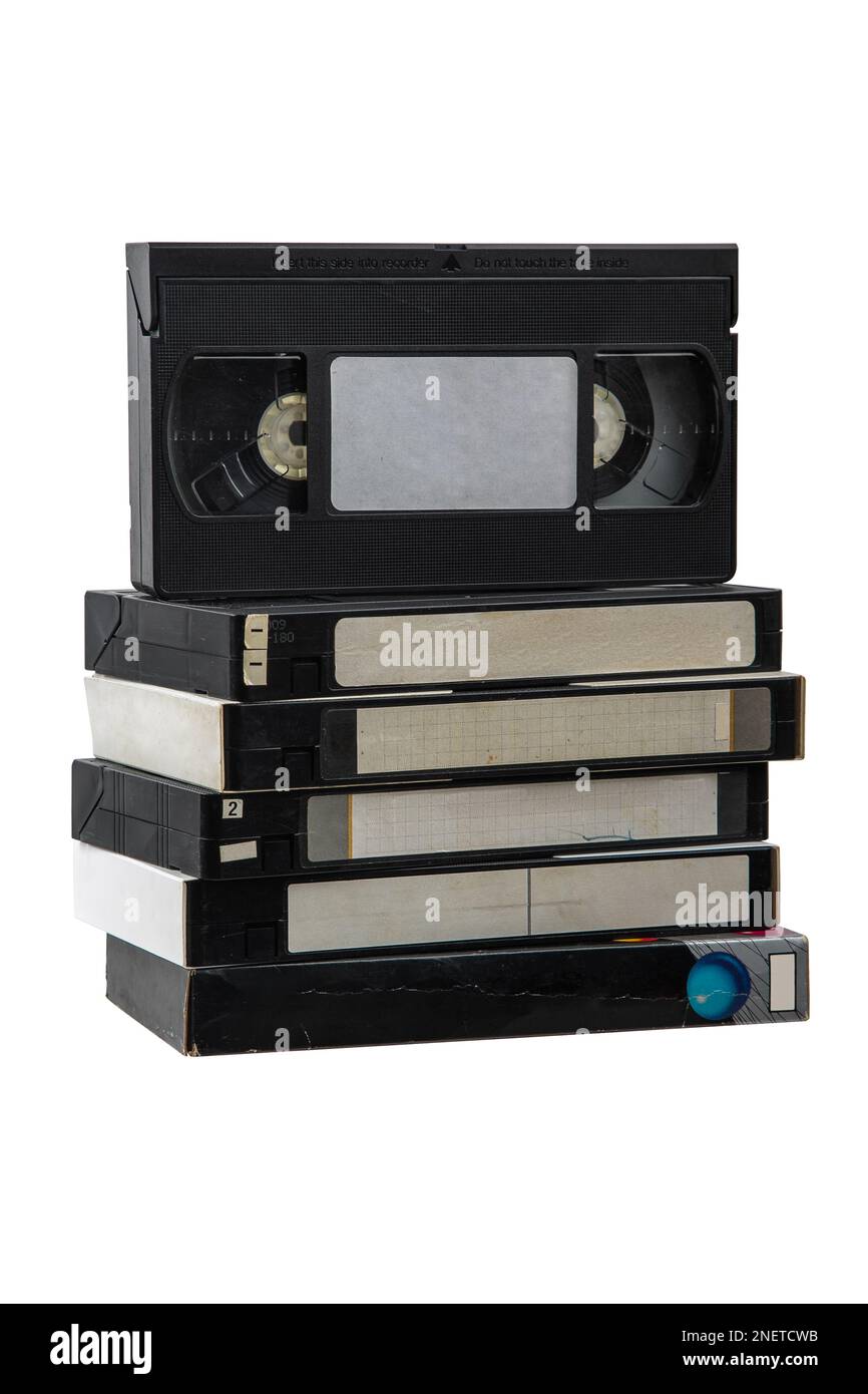 Pile of VHS video cassettes. Vintage media. Isolate on a white ...