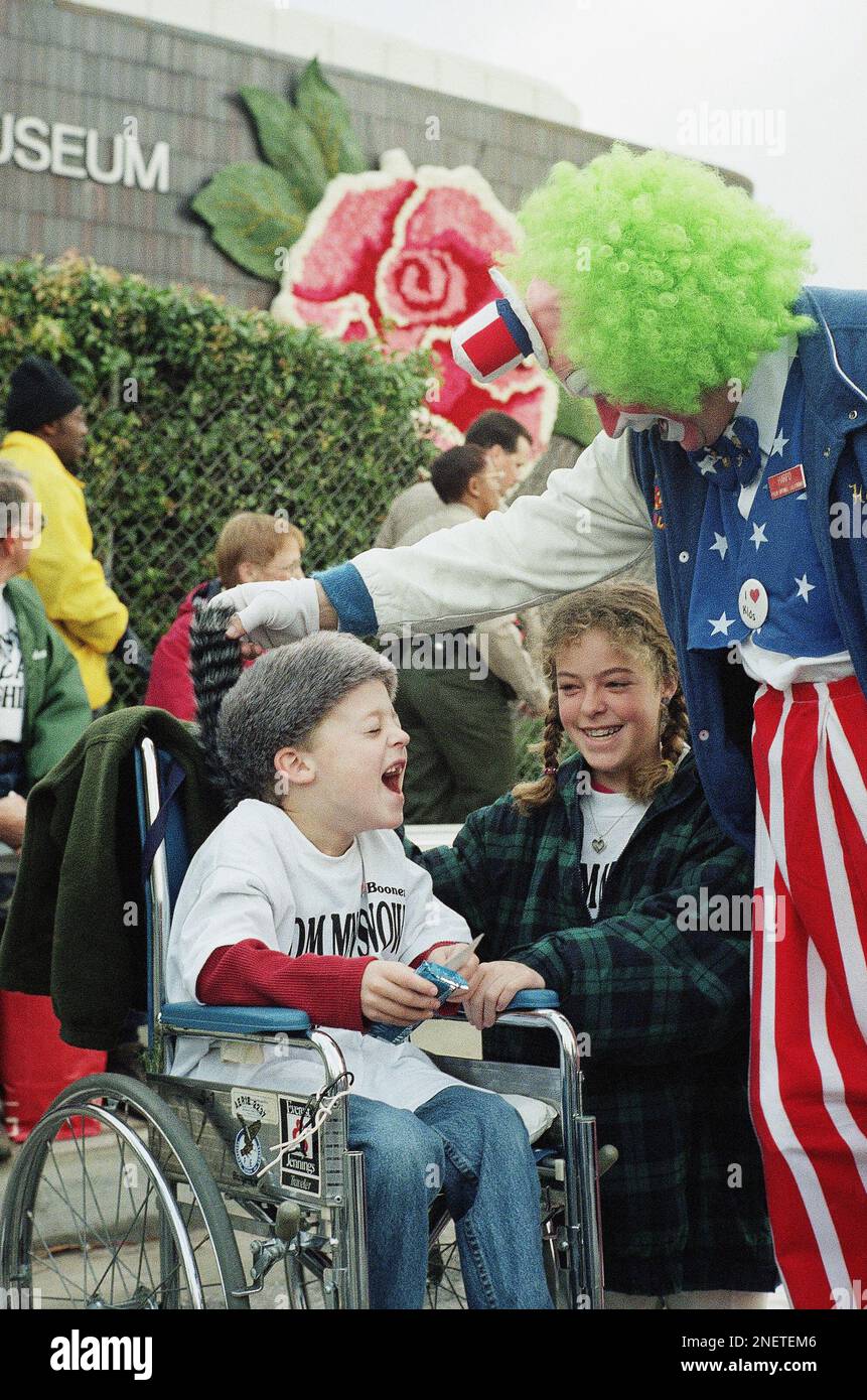 Harpo the clown makes Daniel Haberman, in wheelchair, and his sister ...