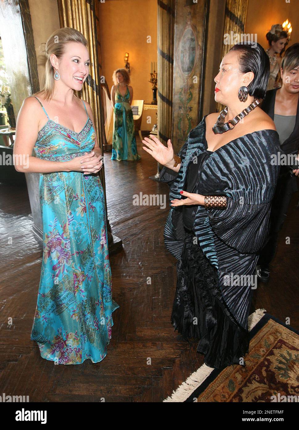 Katie Cook (L) and Sue Wong (R) attend the Sue Wong Spring 2010 Preview ...