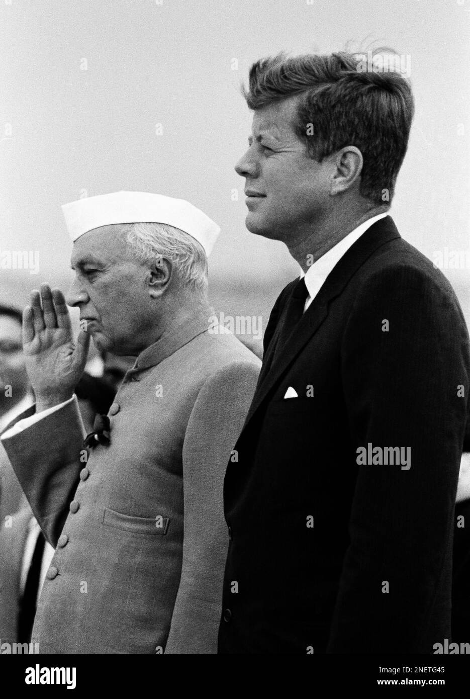 Prime Minister Jawaharlal Nehru of India, acknowledges salute as he ...