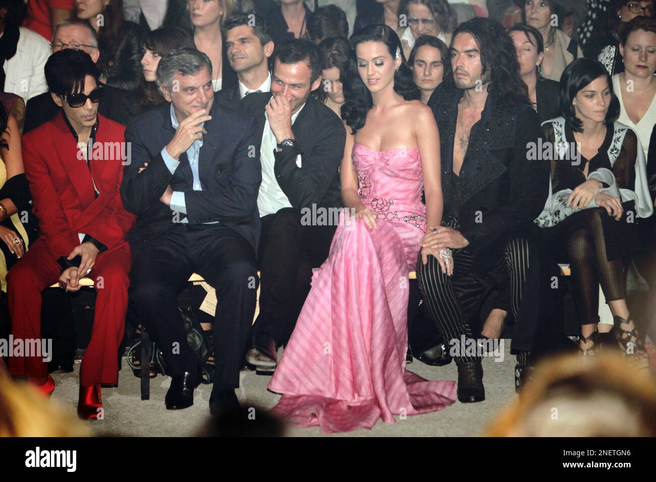 From left, U.S. singer Prince, Dior CEO Sidney Toledano, John Galliano ...