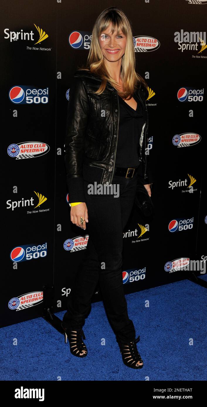 Natasha Henstridge arrives at the Pepsi 500 event hosted by NASCAR ...