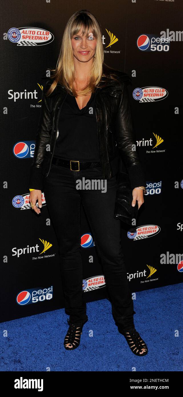 Natasha Henstridge arrives at the Pepsi 500 event hosted by NASCAR ...