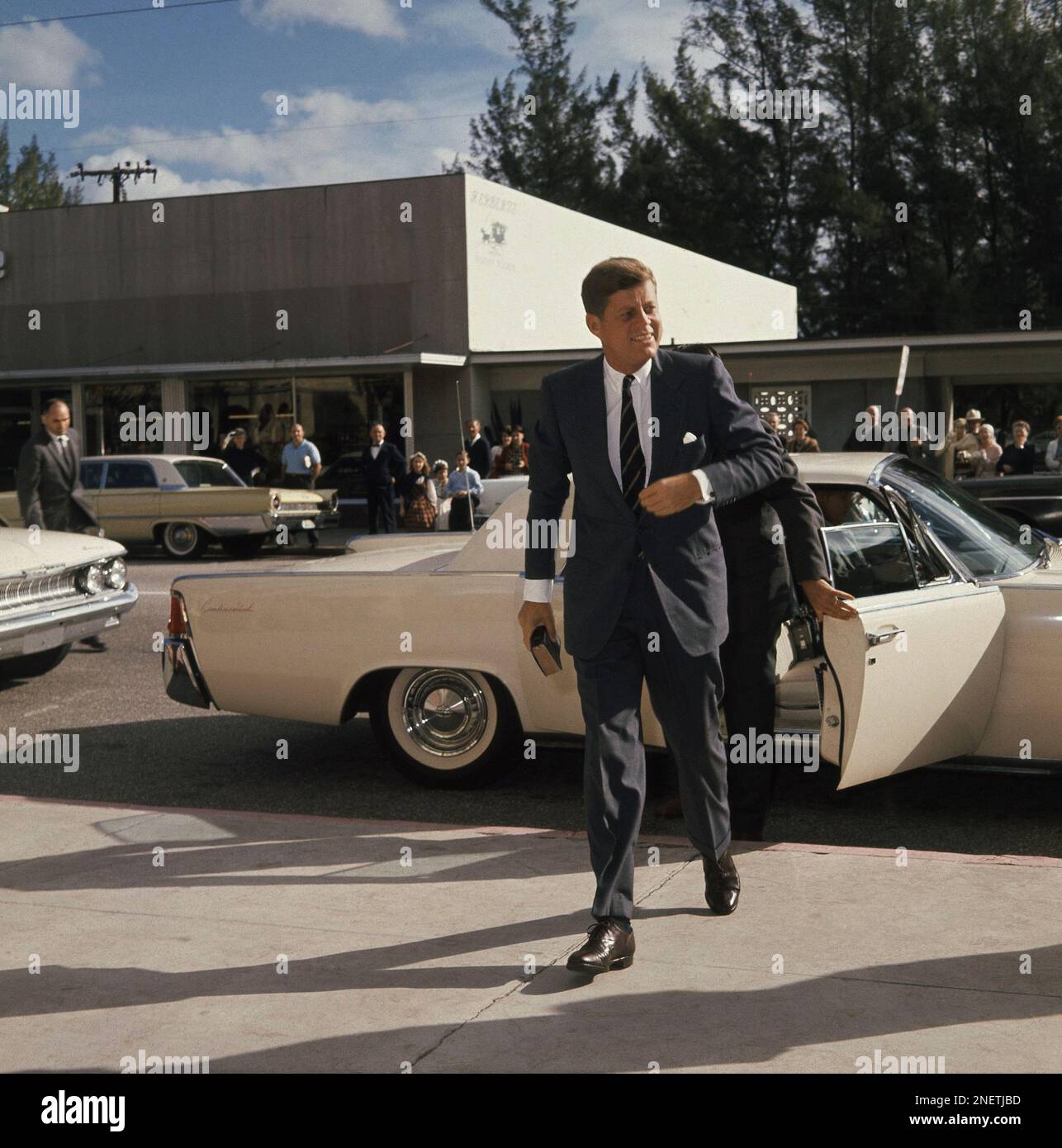 Clutching a prayer book in his left hand, President-elect John F ...