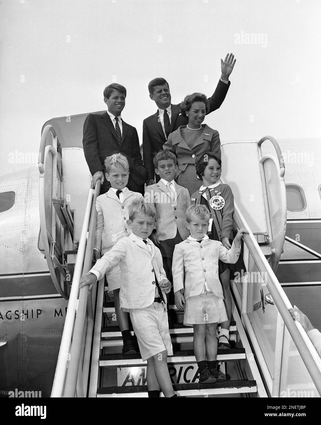Sen. John F. Kennedy’s Democratic residential nominee, waves from plane ...