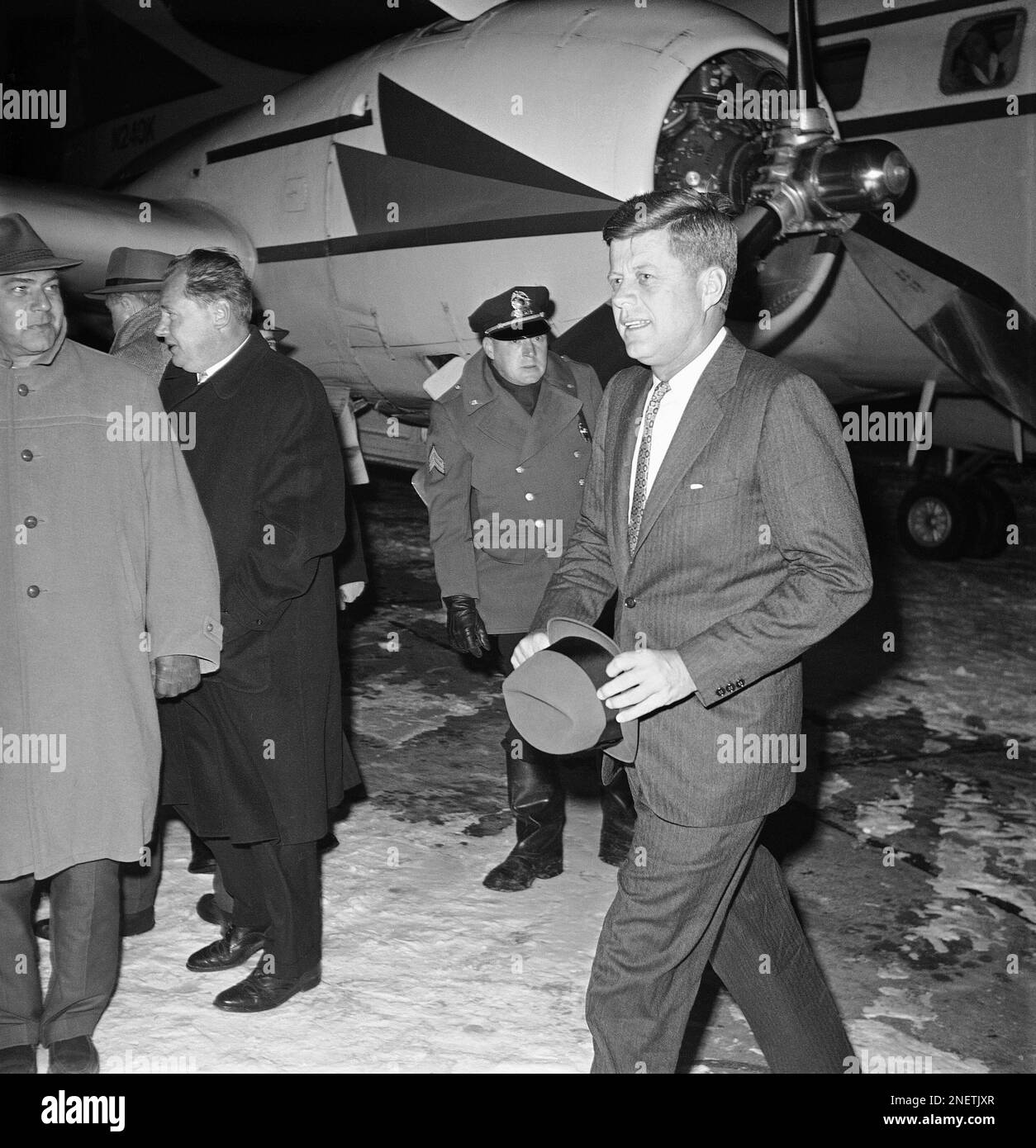 President-elect John F. Kennedy, his hat in his hands and without a ...