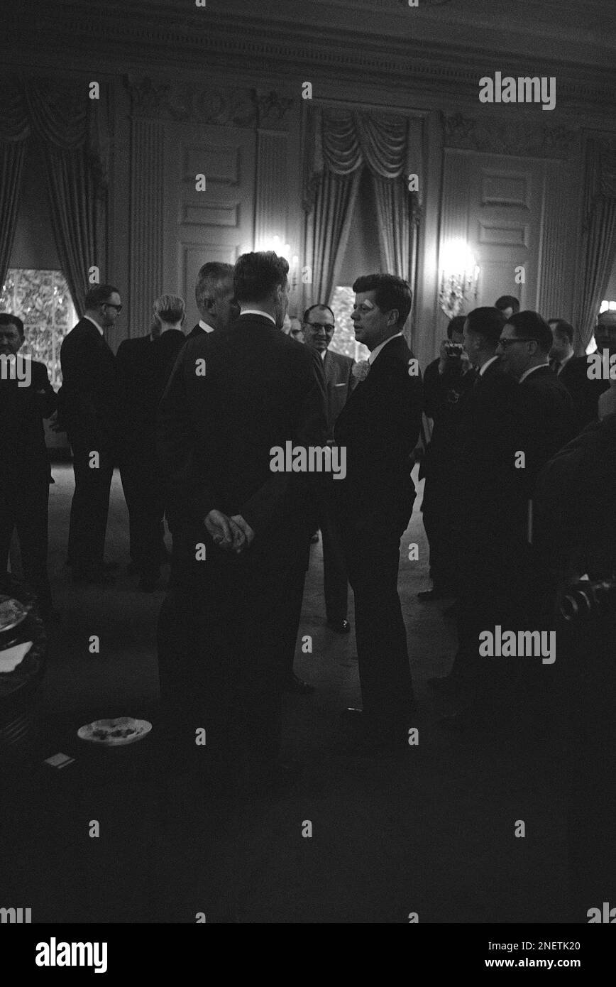 President John F. Kennedy chats with members of the House of ...