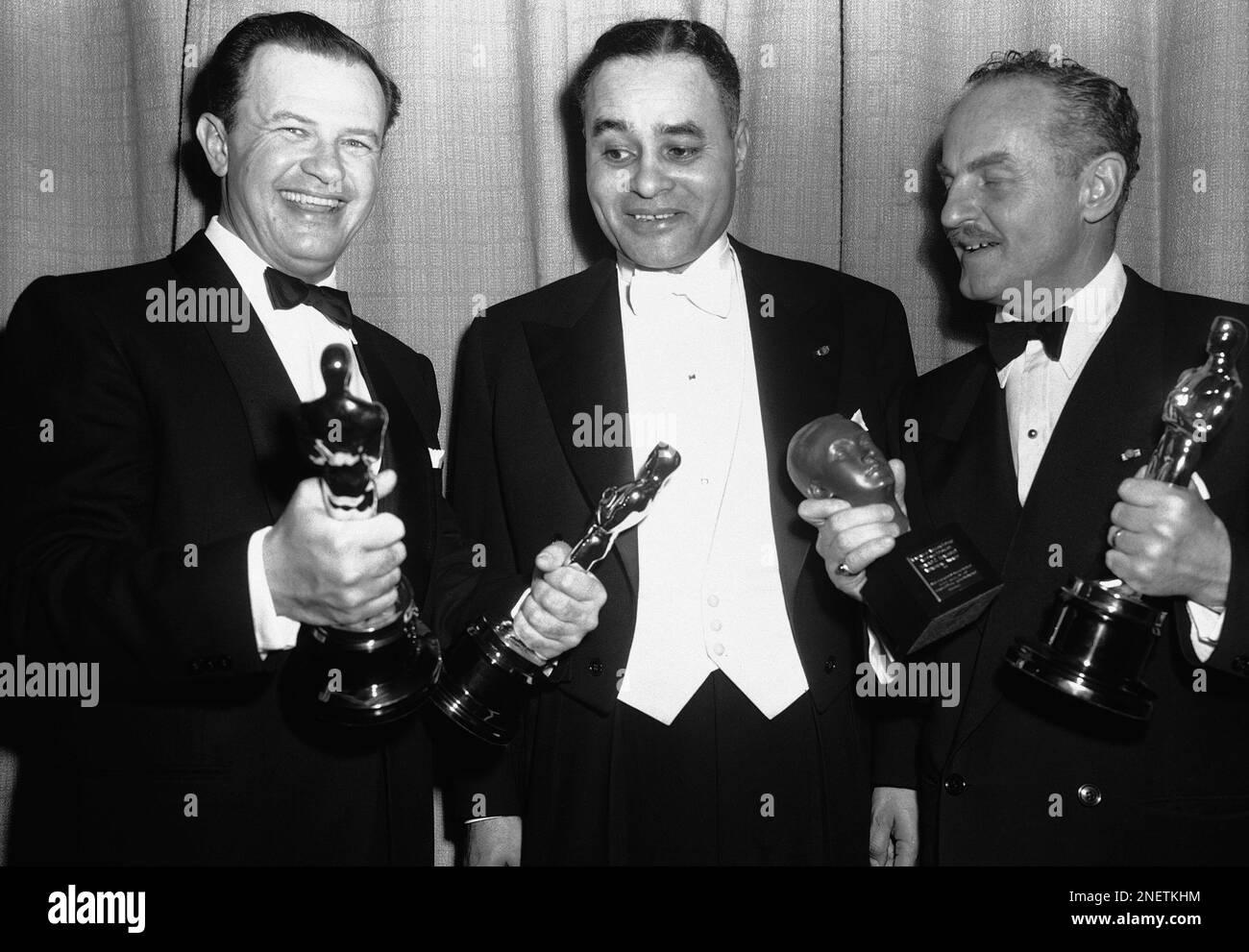 Joseph L. Mankiewicz (left) and Darryl Zanuck, stand with Dr. Ralph ...