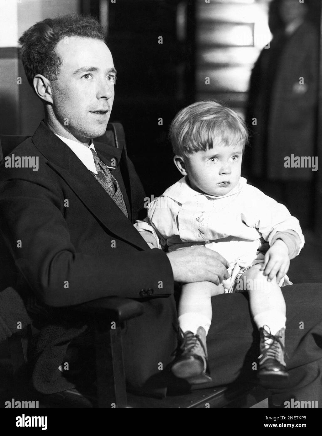 Robert Vincent Ogle, a subway brakeman, and his son, Vincent, pictured ...