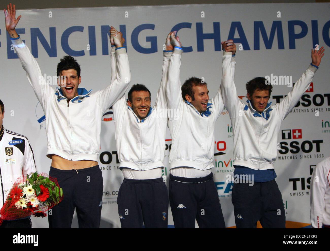 Gold medallist Italian team members celebrate their victory at the ...