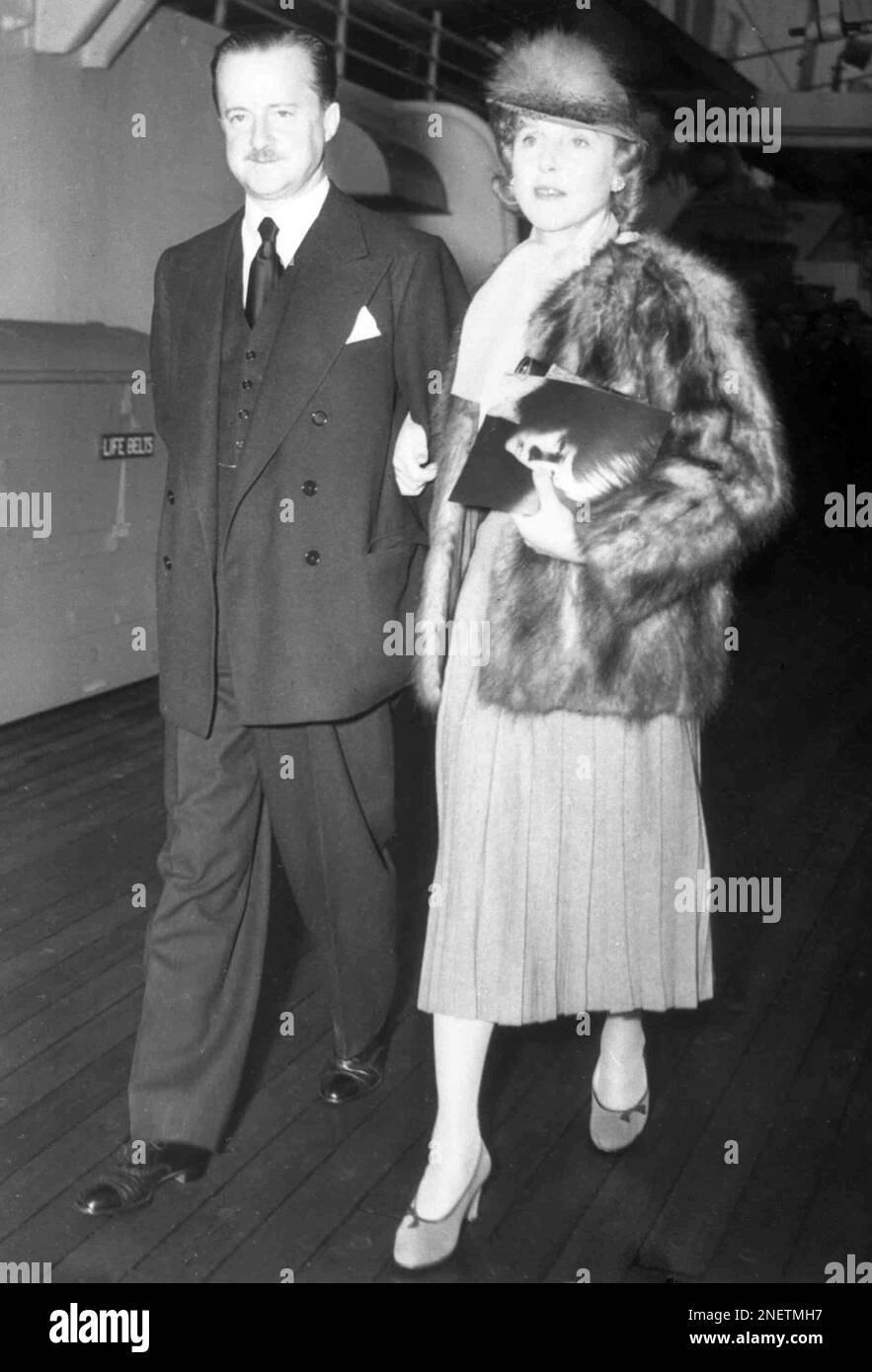 Britain's former First Lord of the Admiralty Alfred Duff Cooper, with his wife Lady Diana Duff ...