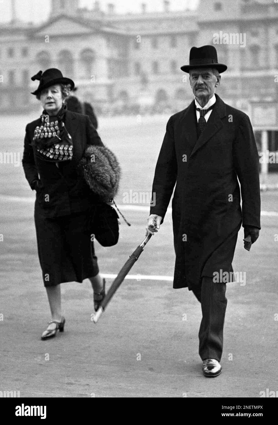 Britain's Prime Minister Neville Chamberlain and his wife Anne, walk ...