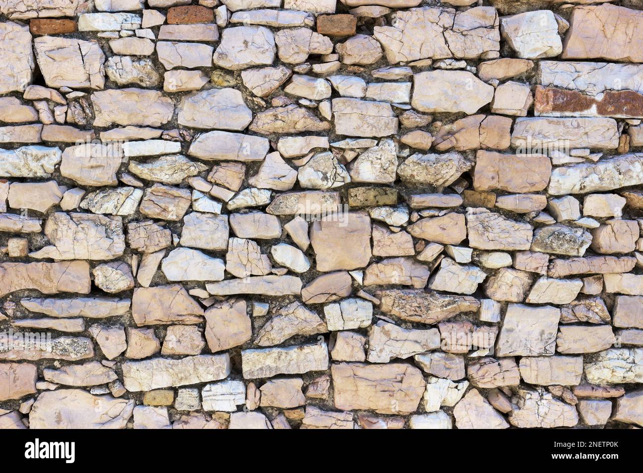 Detail of an old rural stone wall Stock Photo - Alamy